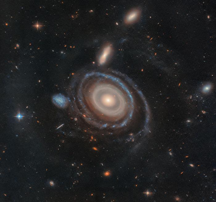 The Bullseye Galaxy: A Stunning Case of a Galaxy 'Hit' by a Dwarf ...